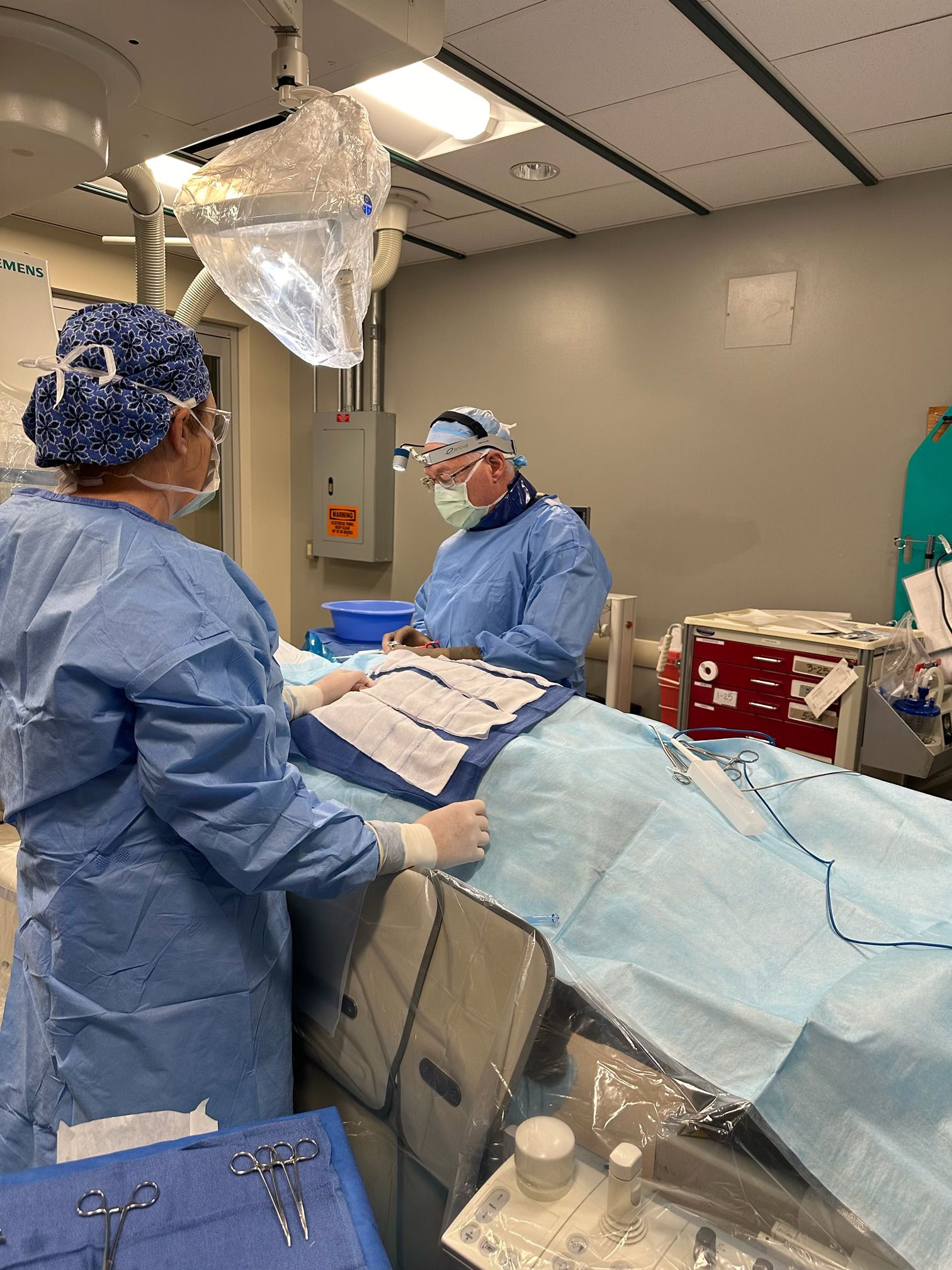 Dr. Mike Hagley, a Hutchinson interventional cardiologist, remains ...